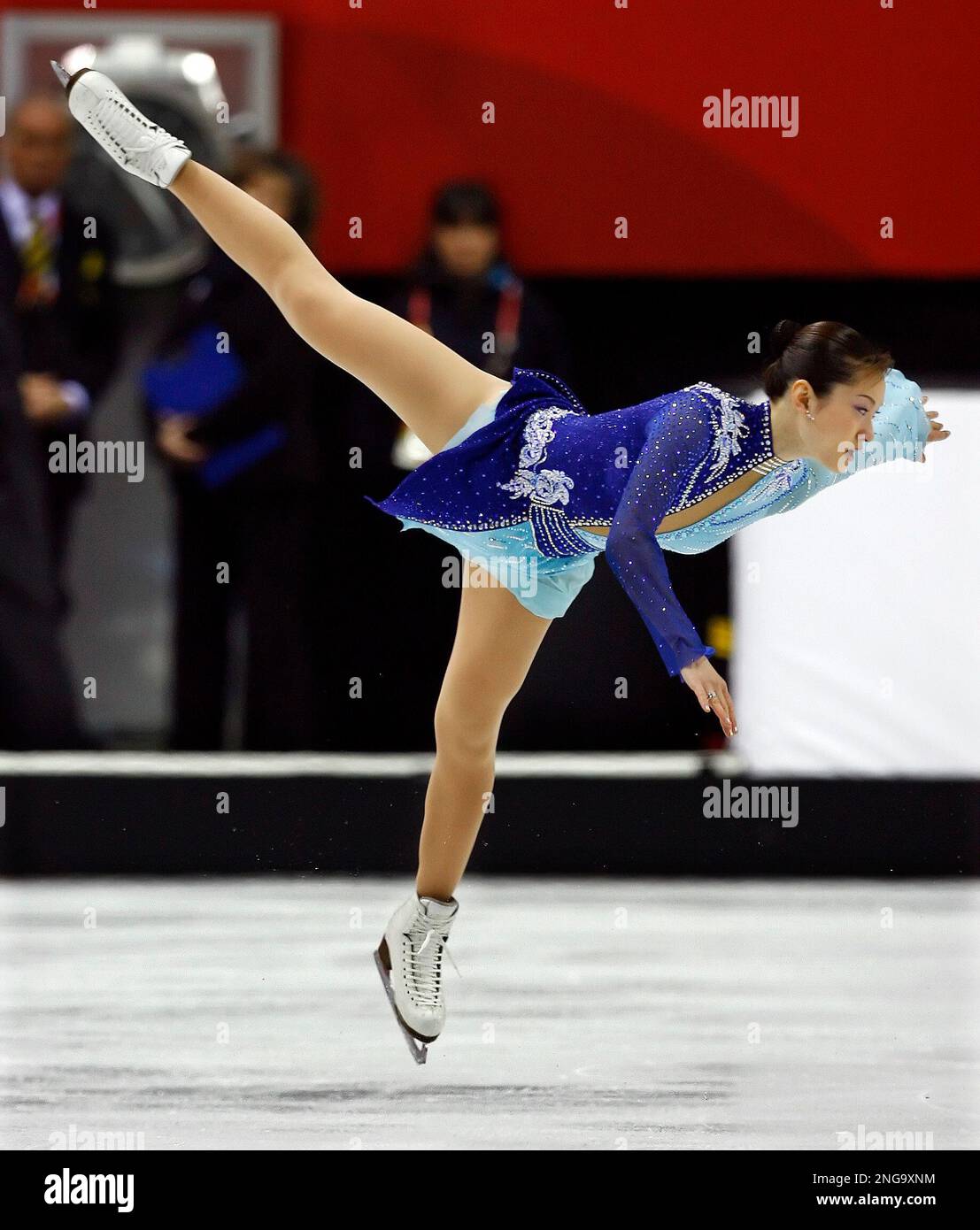Japan's Shizuka Arakawa performs a flying camel spin during her routine ...
