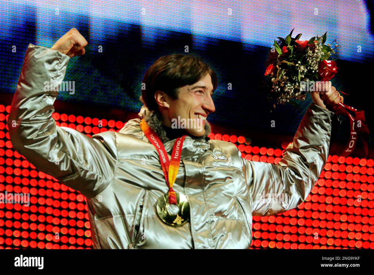 Italy's Enrico Fabris celebrate his gold medal during the medal ...