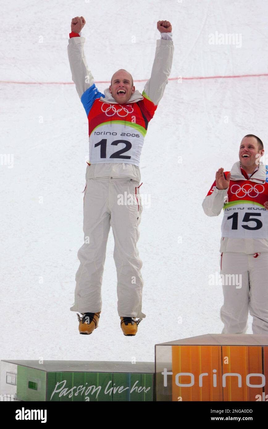 Switzerland's Simon Schoch (12) celebrates his silver medal as his ...