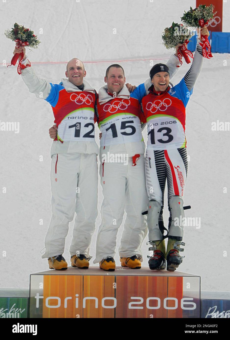 Gold medalists Philipp Schoch of Switzerland (15) celebrates with his ...