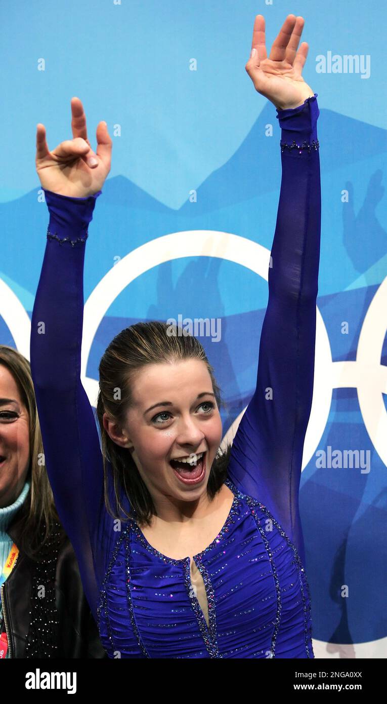 Emily Hughes of the United States waves to spectators following her ...