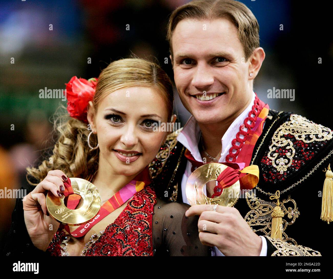 Russia's Roman Kostomarov and his partner Tatiana Navka pose with their ...