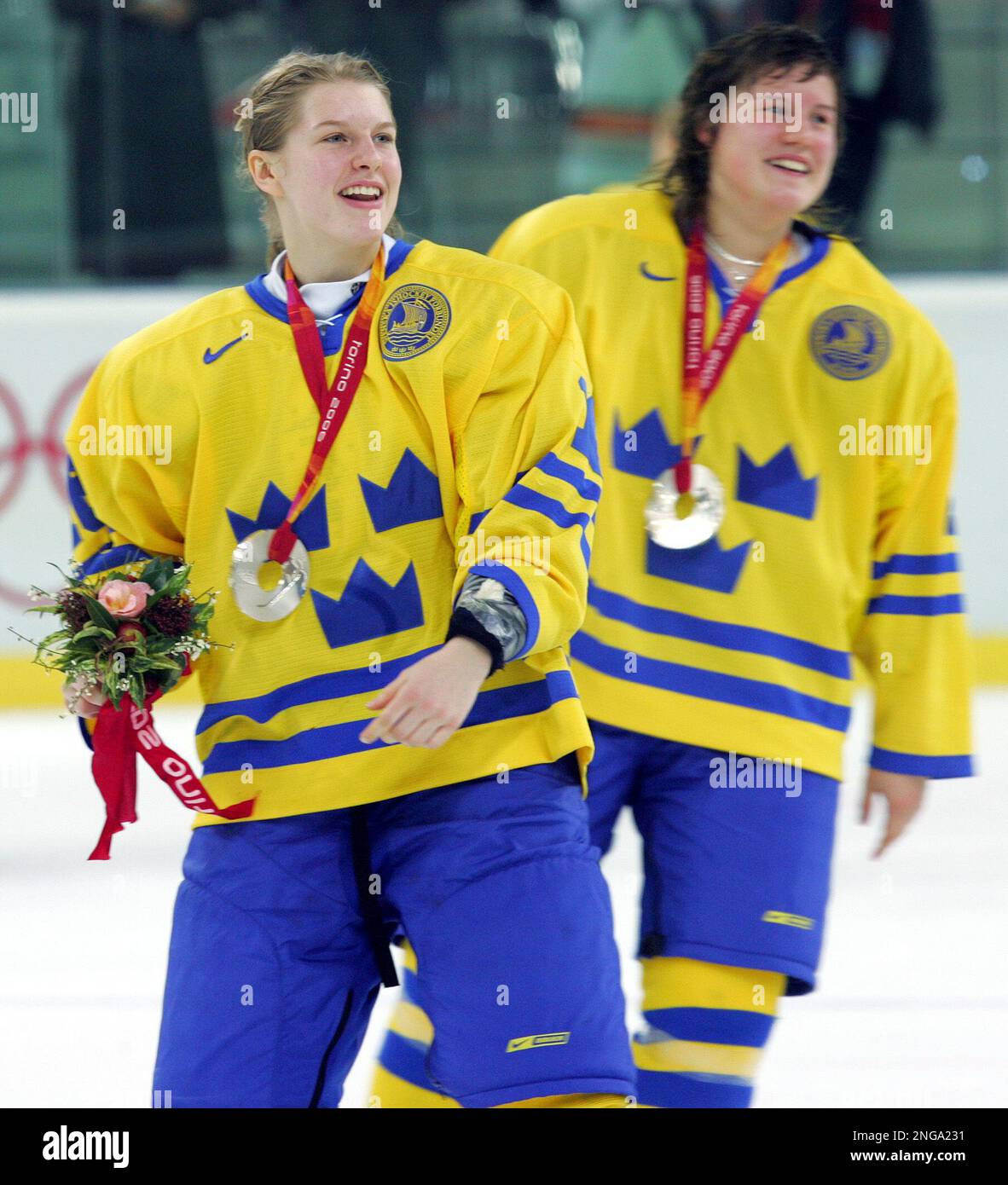 Sweden's Pernilla Winberg, left, and womens ice hockey teammate Emma ...