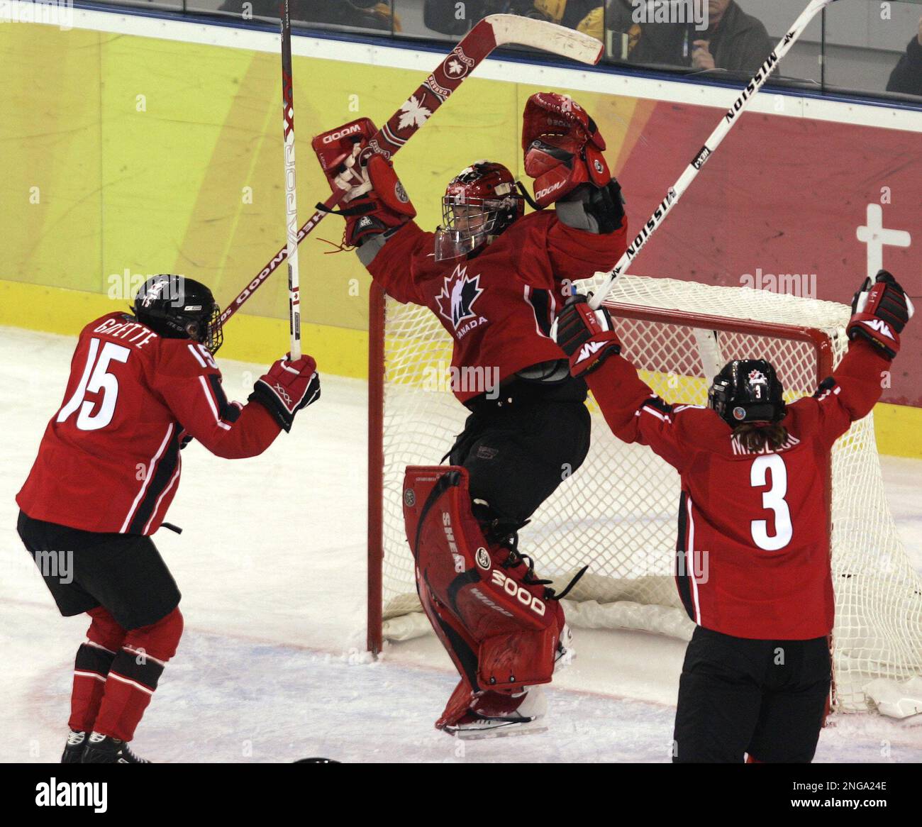 Team Canada's goaltender Charline Labonte celebrates with teammates ...
