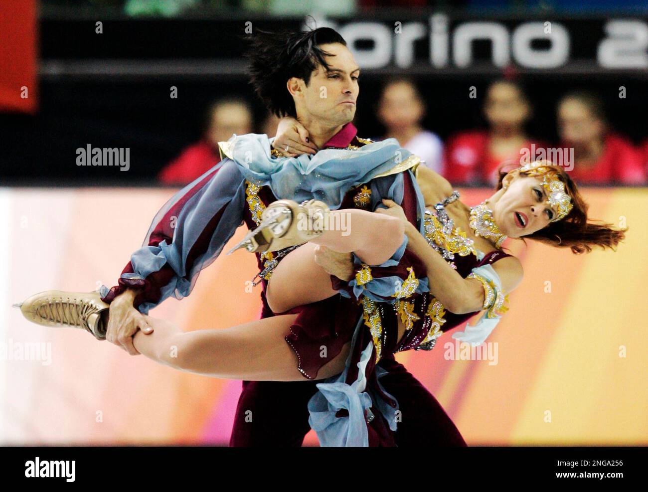 Italy's Maurizio Margaglio carries his partner Barbara Fusar Poli ...