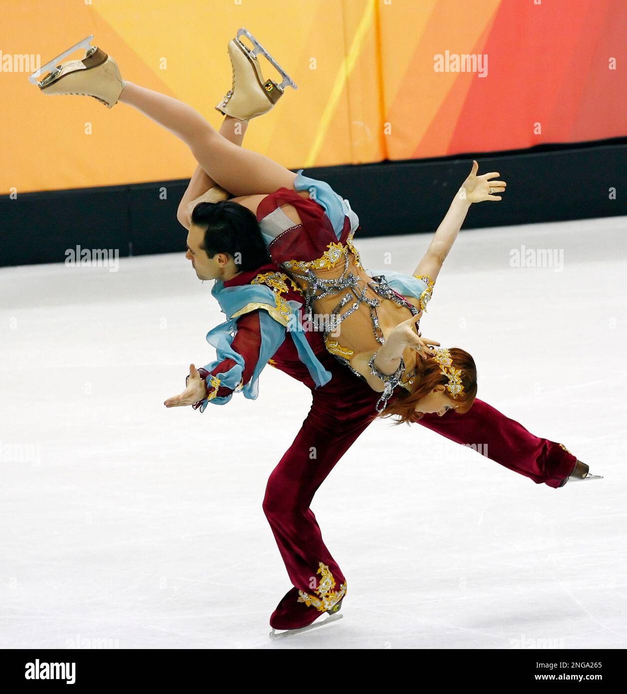 Italy's Maurizio Margaglio carries his partner Barbara Fusar Poli ...
