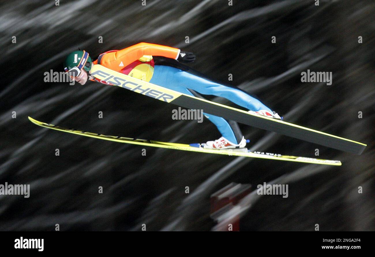 Russia's Dmitry Vassiliev jumps during the first jump of the Ski ...