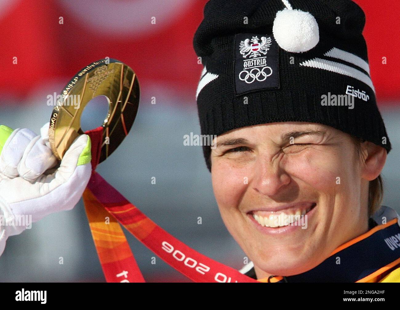 Michaela Dorfmeister of Austria shows the gold medal of the Women's ...