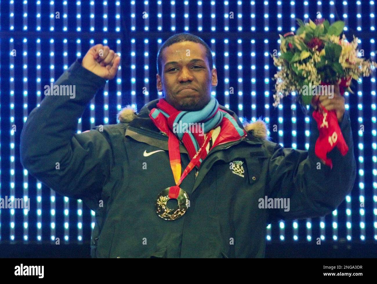 Shani Davis, of the United States, celebrates his gold medal during the ...