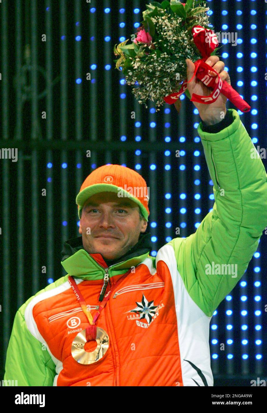 Bronze medalist Sven Fischer, of Germany, celebrates during the medal ...