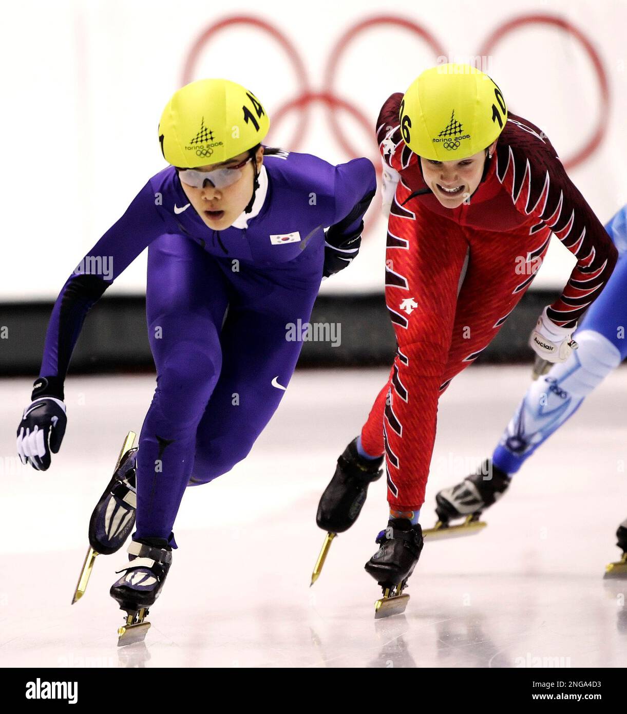 Canada's Amanda Overland, right, chases down Korea's Choi Eun-Kyung ...