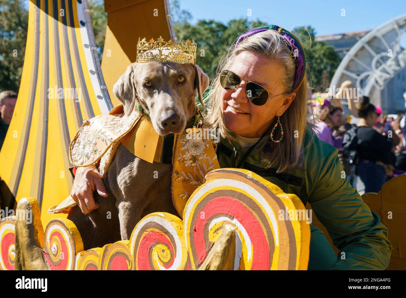 Dogs and their owners are seen at the Krewe Of Barkus parade on Sunday ...