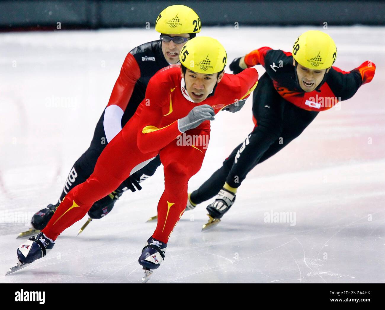 China's Li JiaJun leads Belgium's Pieter Gysel, left and Japan's Satoru Terao in their men's ...