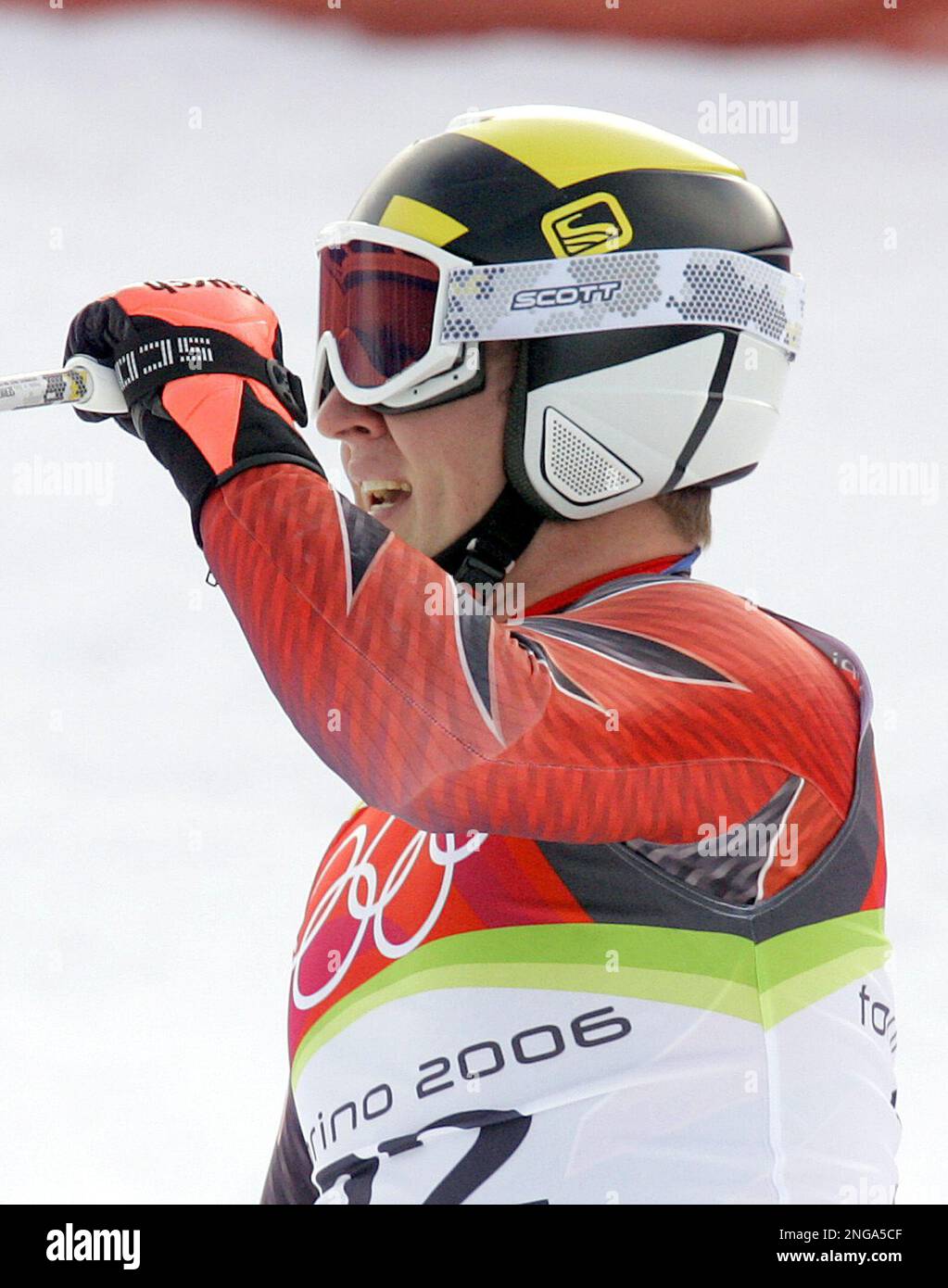 Switzerland's Ambrosi Hoffmann reacts as he arrives in the finish area ...