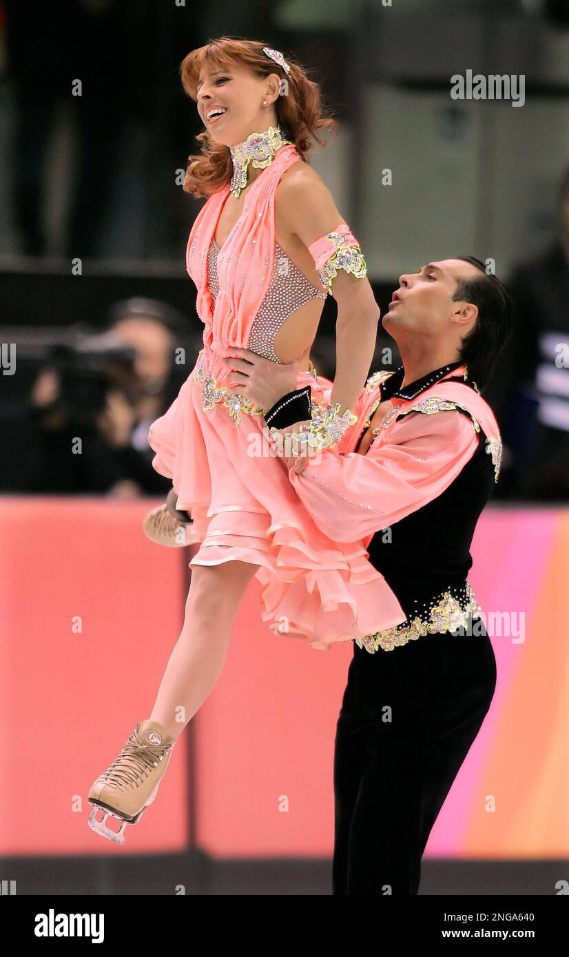 Italys Barbara Fusar Poli and her partner Maurizio Margaglio skate ...