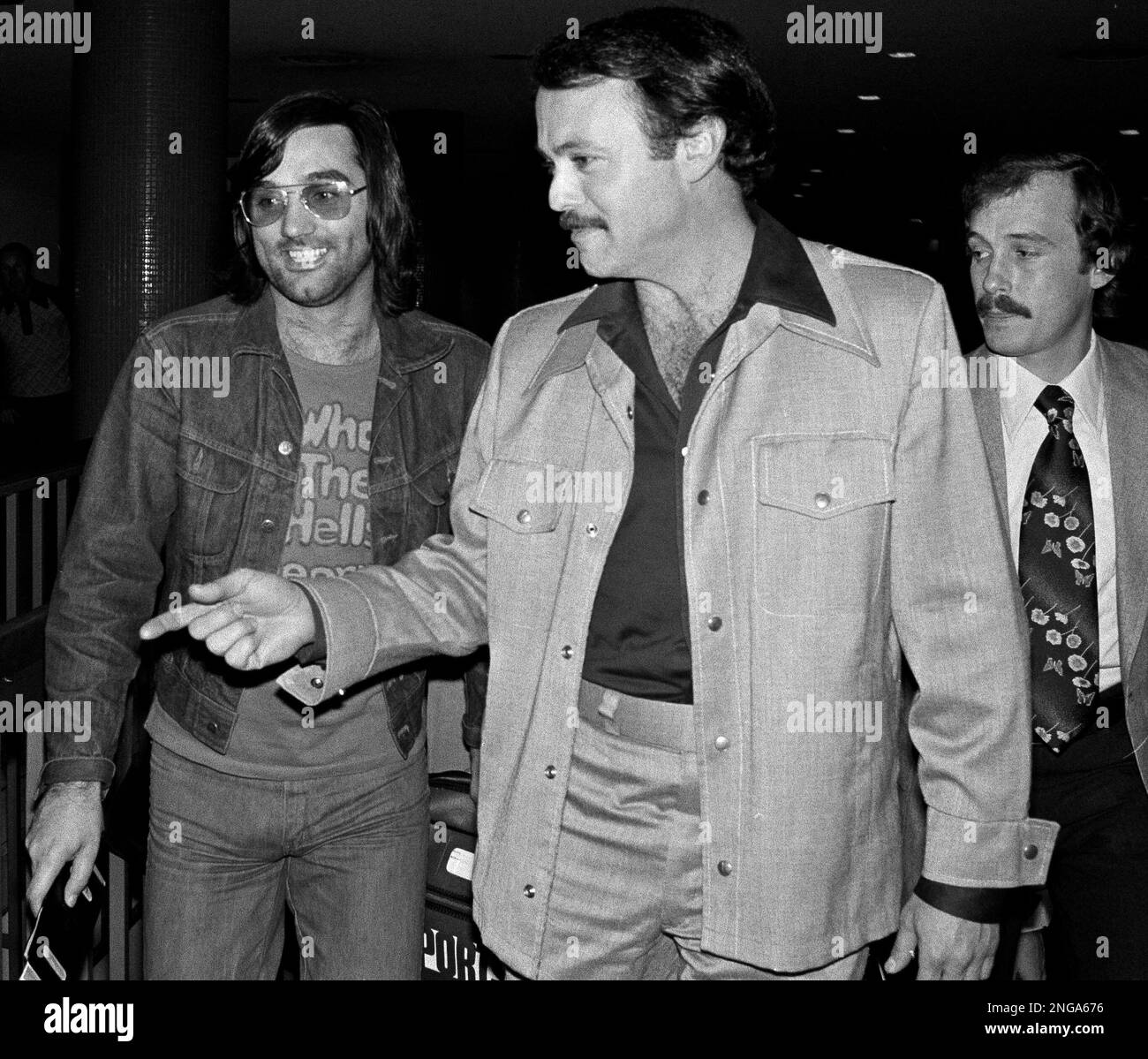 John Chaffetz, an official of the Los Angeles Aztecs, points the way ...