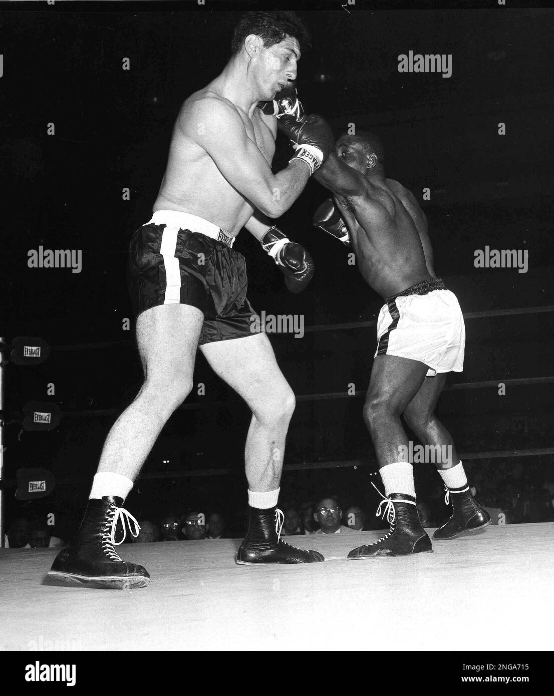 U.S. Charles "Sonny" Liston, right, drives straight left into the jaw ...