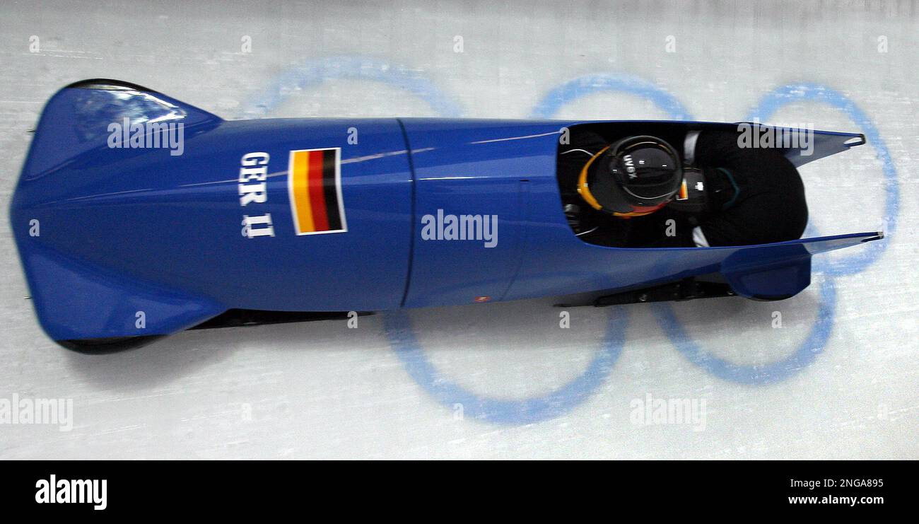 German pilot Matthias Hoepfner slides down the track during an Olympic ...