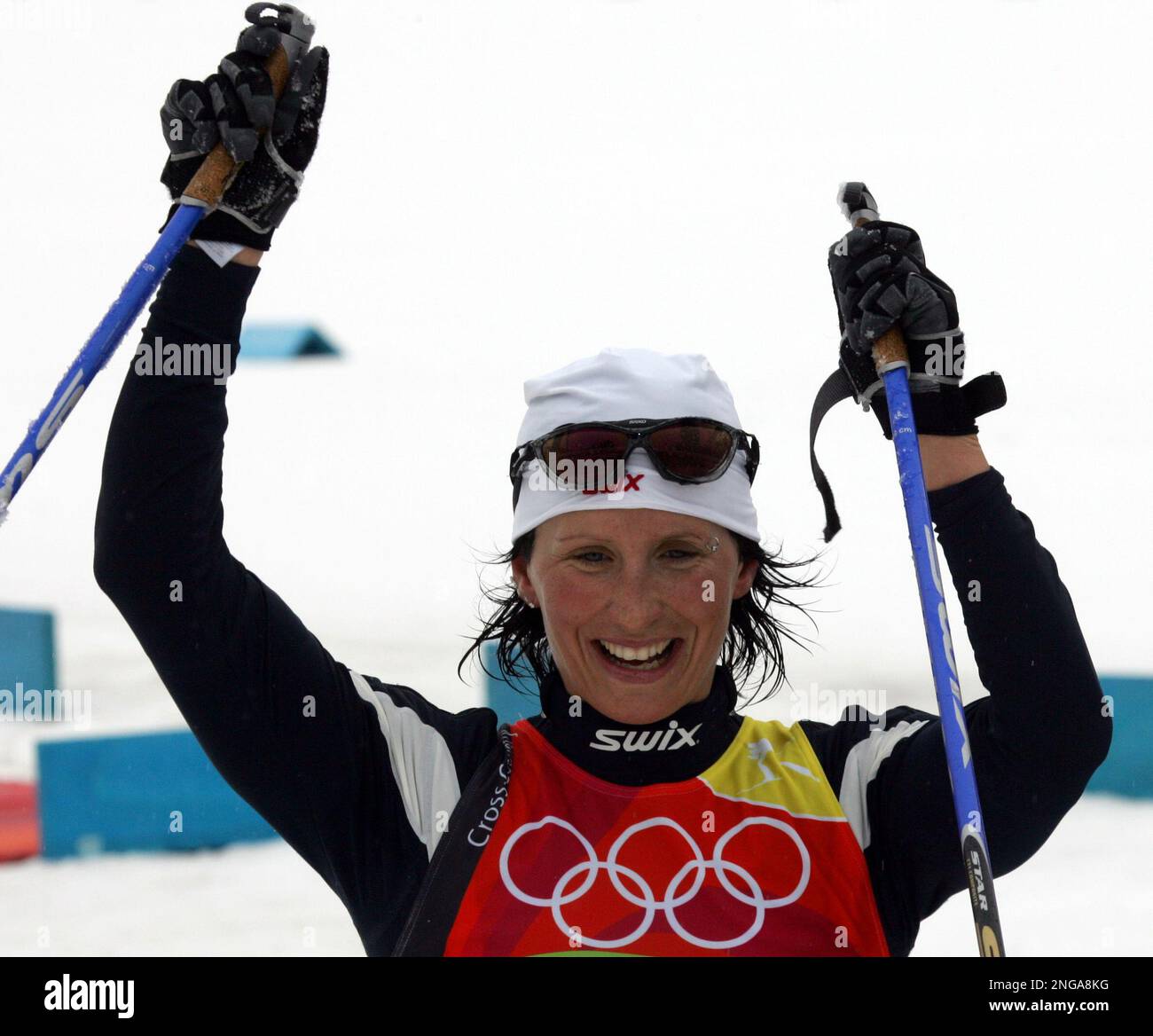 Marit Bjorgen of Norway celebrates after clinching the silver medal in ...