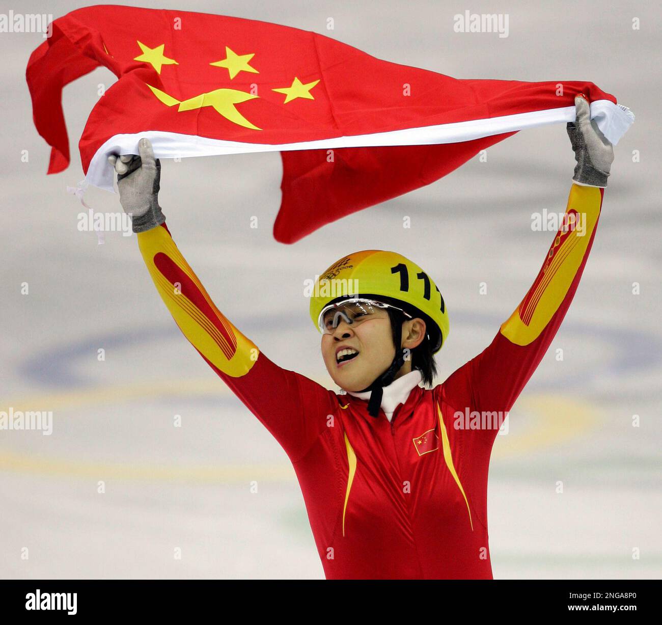 Wang Meng, of China, celebrates winning the 500-meter gold medal in ...