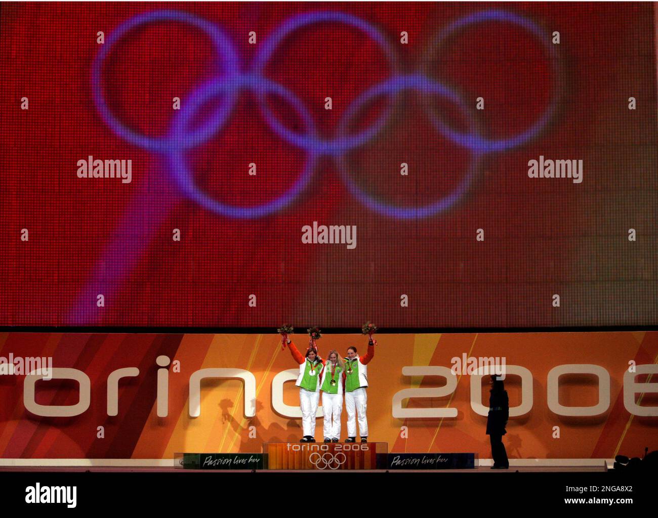 Germany's Sylke Otto, center, celebrates her luge gold medal with ...