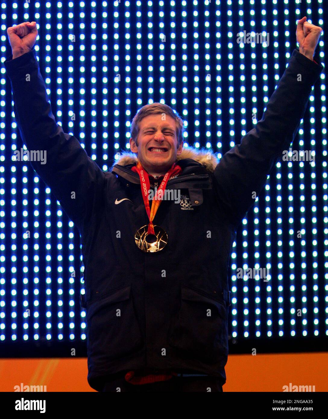 Joey Cheek, of the United States celebrates his gold medal during the ...