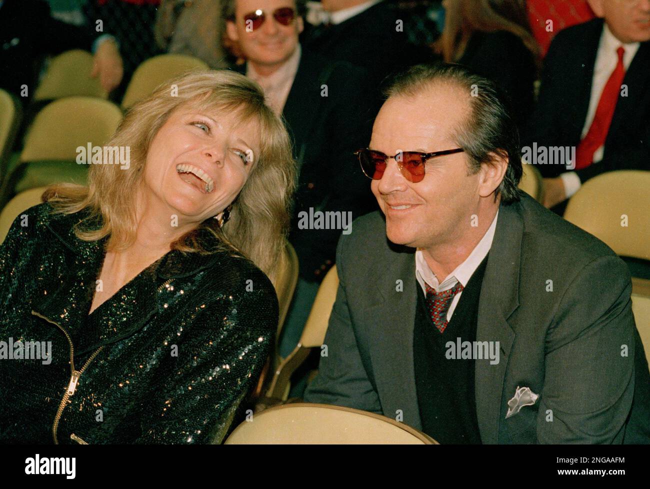 Cheryl Tiegs and Jack Nicholson are shown ringside at the Tyson-Holmes ...