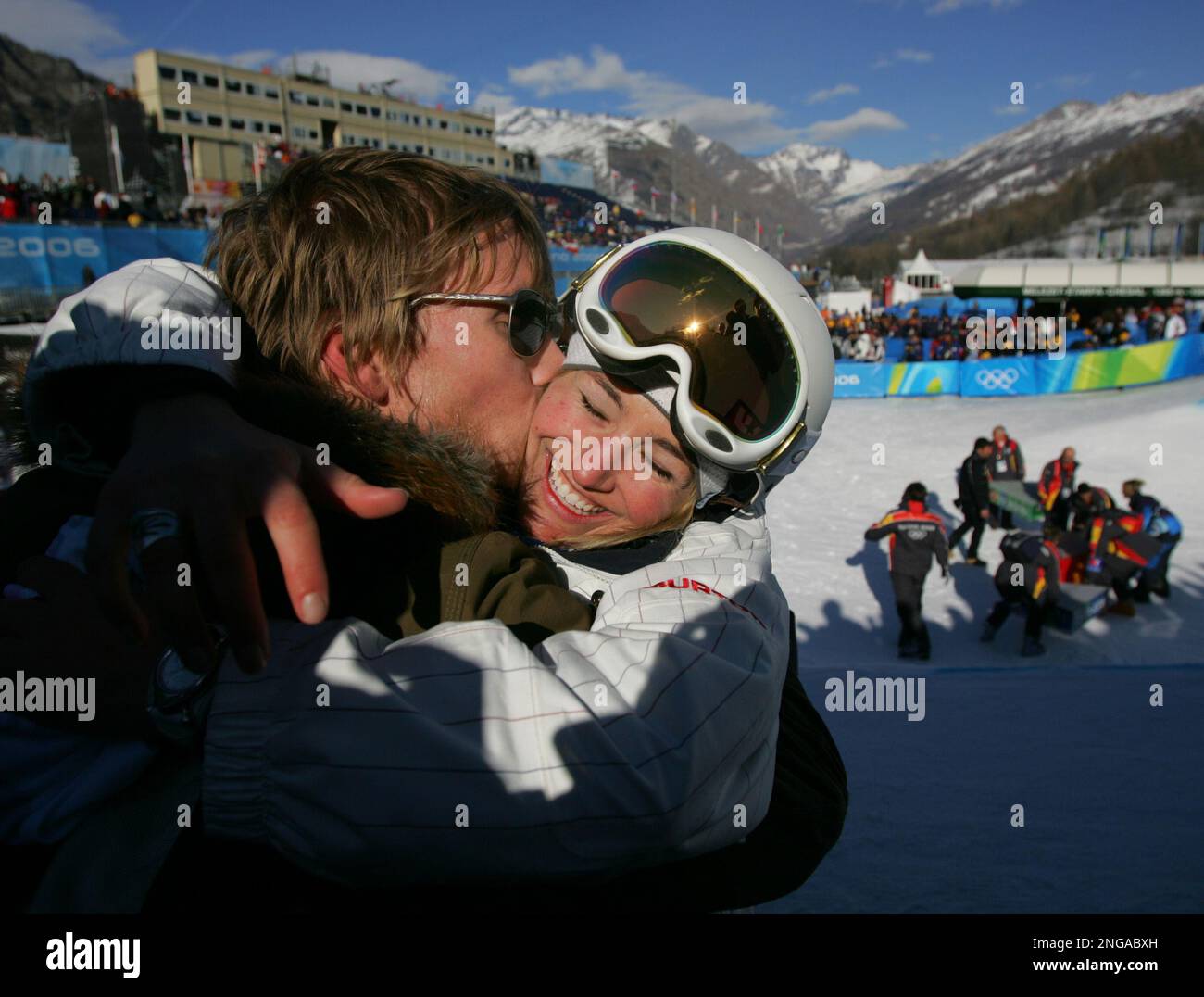 American silver medallist Gretchen Bleiler, right hugs her boyfriend ...