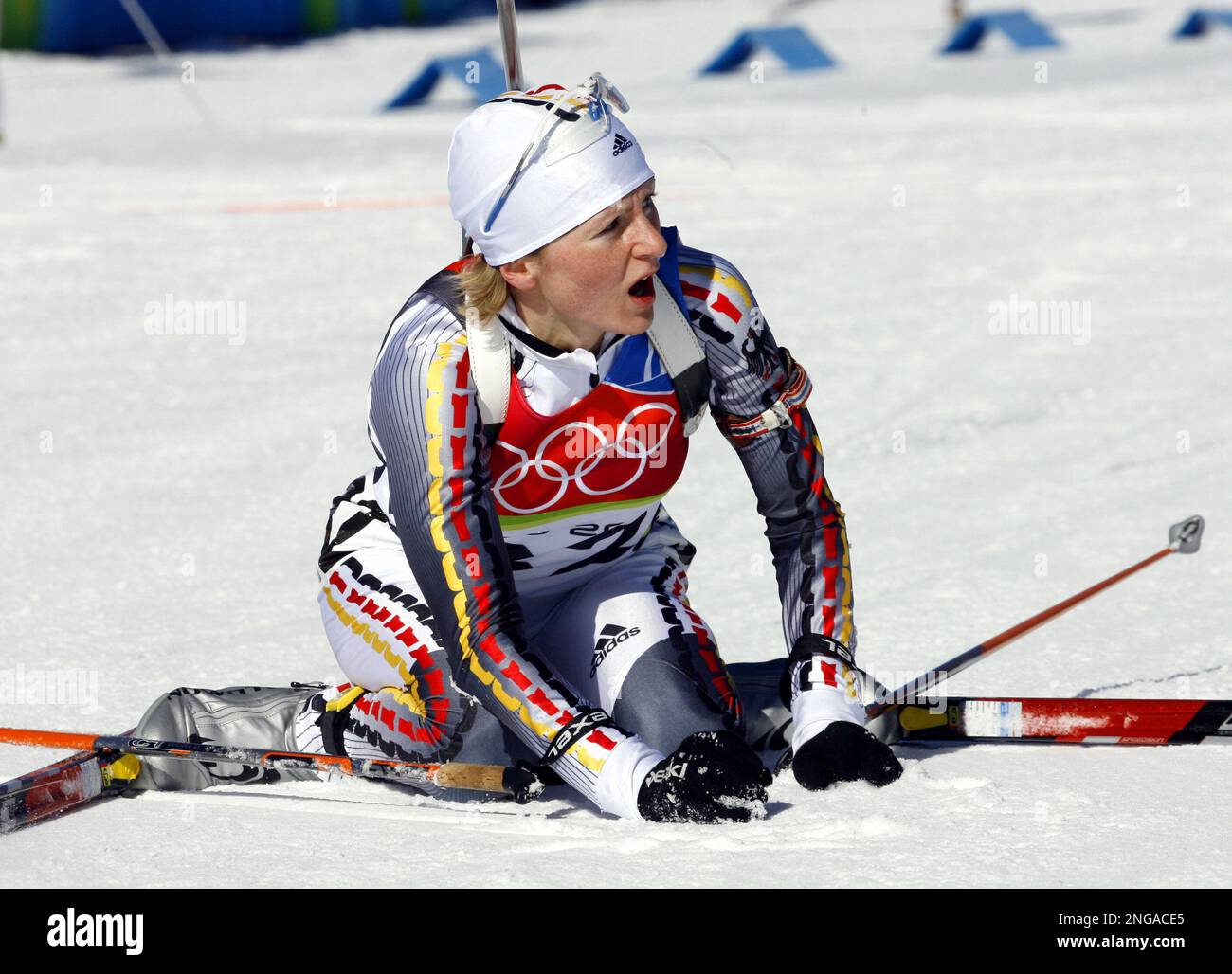 Germany's Martina Glasgow collapses after crossing the finish line to ...