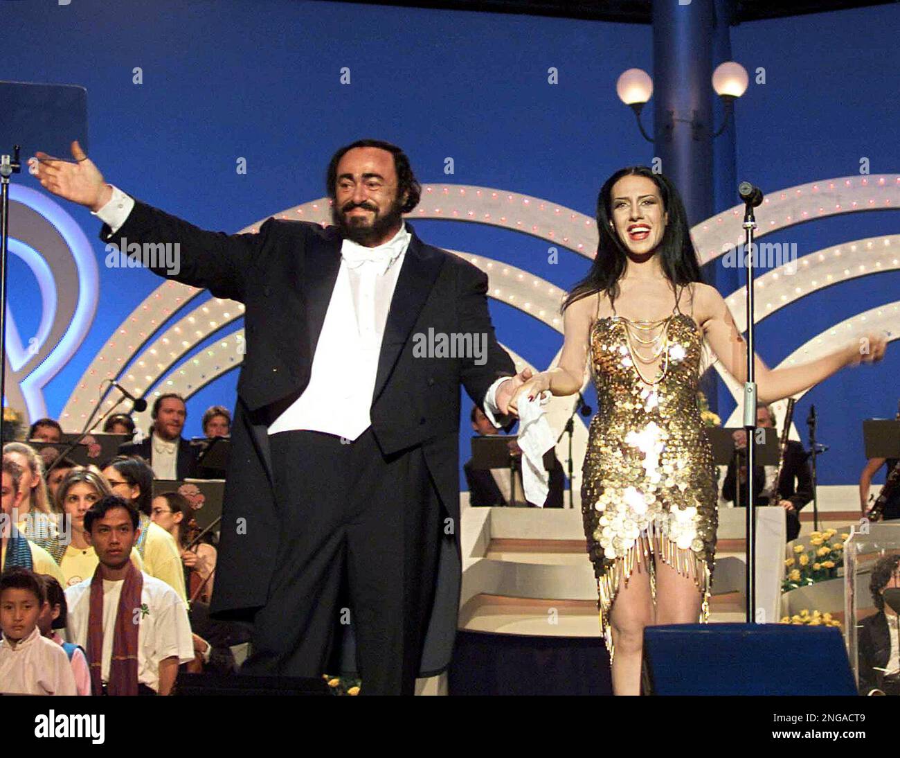 Italian tenor Luciano Pavarotti, left, and Spanish singer Monica ...