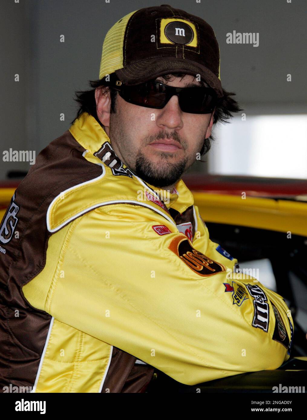 Elliott Sadler waits in a garage during practice for the Daytona 500 ...