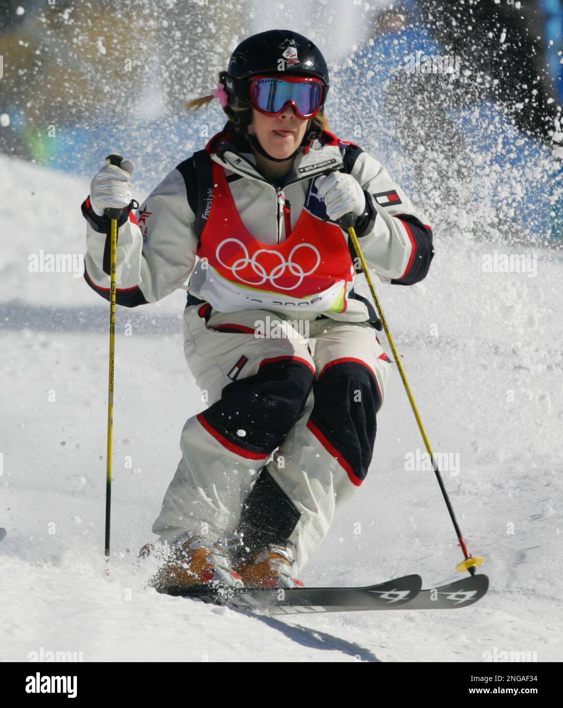 American Hannah Kearney grimaces as she skis down the bumps after ...