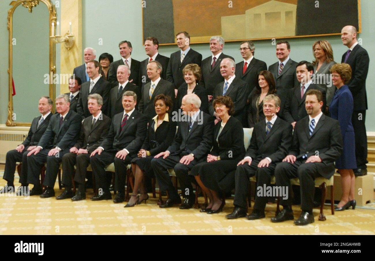 Prime Minister Stephen Harper poses for a photograph with his new ...