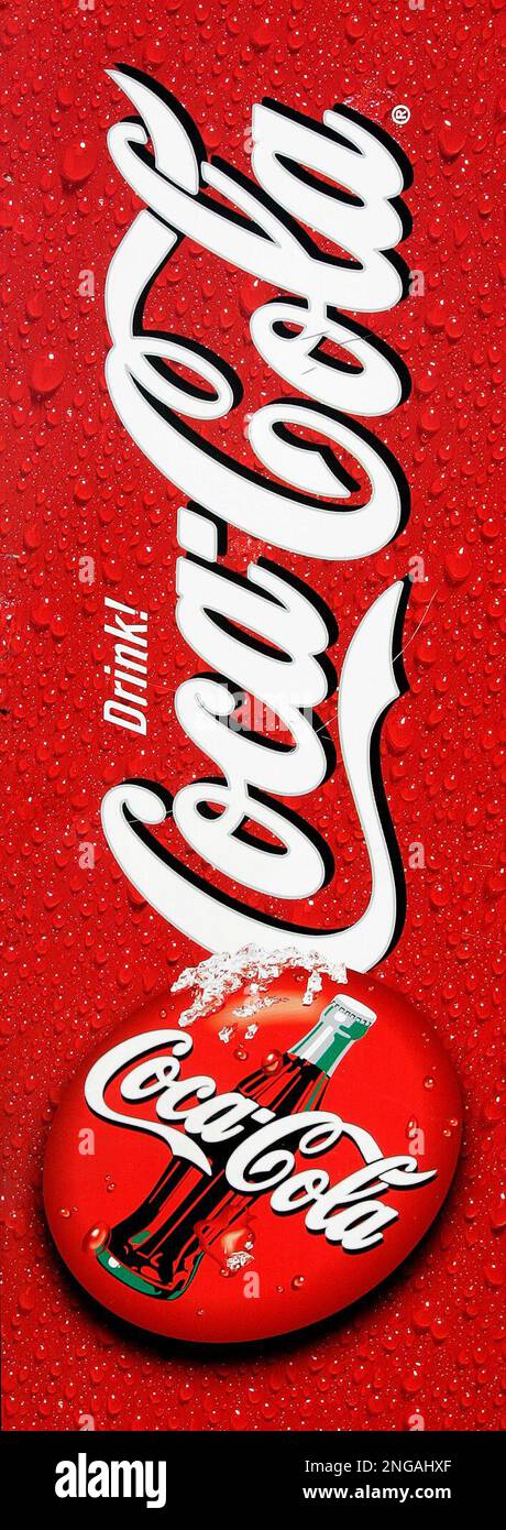 The Coca-Cola name decorates the side on a soda machine at the Swire ...