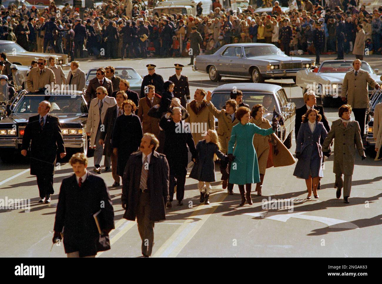 President Jimmy Carter and his wife Rosalynn walk on Washington's ...