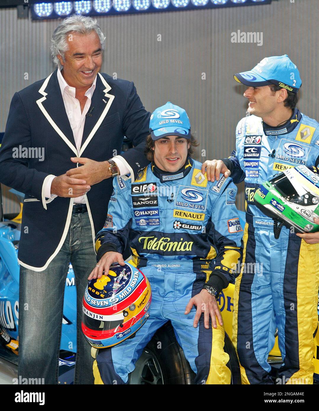 Renault F1 team managing director, Flavio Briatore of Italy, left, poses with his Formula One ...