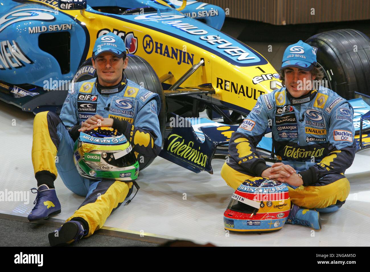 World Champion Fernando Alonso of Spain, right, and Giancarlo Fisichella of Italy, pose for ...