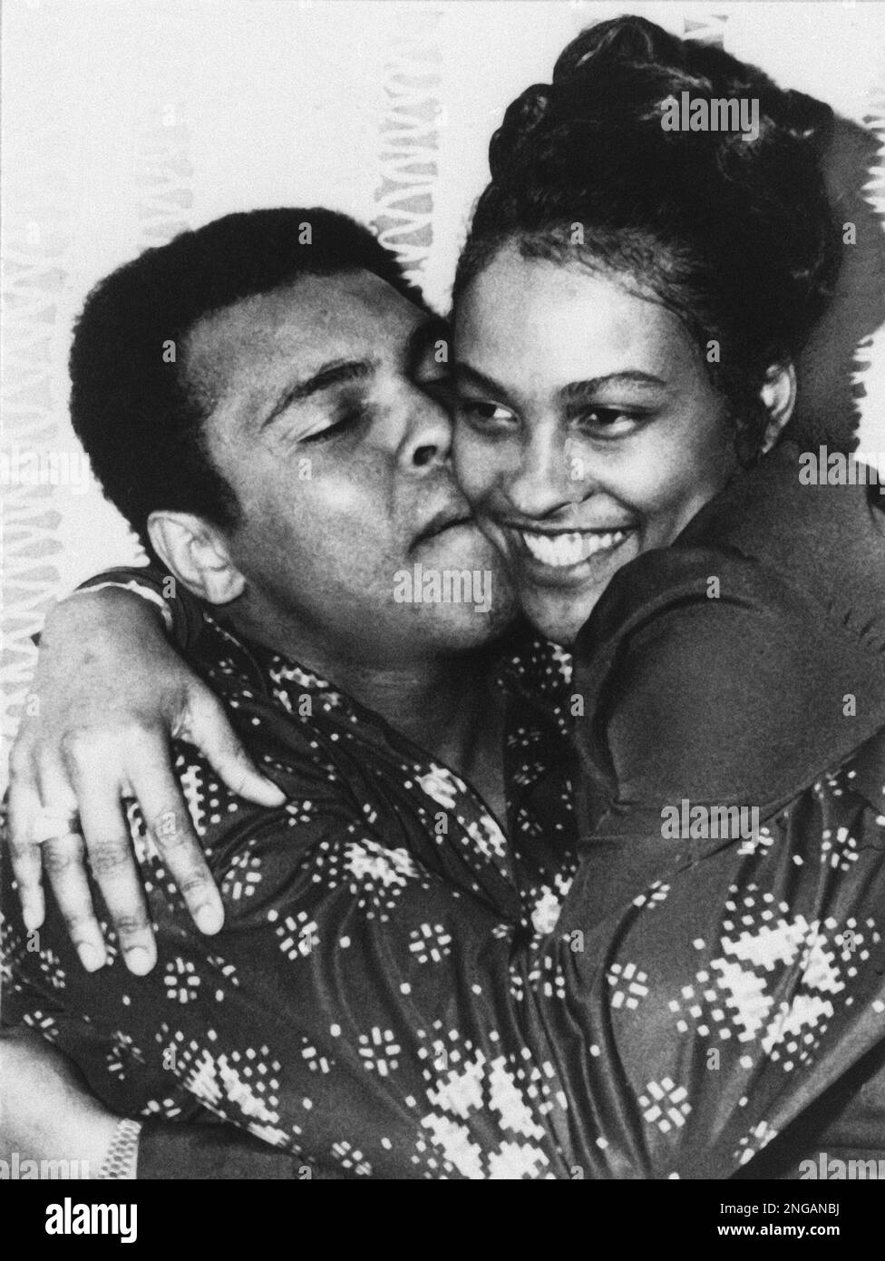 Heavyweight boxer Muhammad Ali hugs his second wife Belinda Ali in 1975 ...