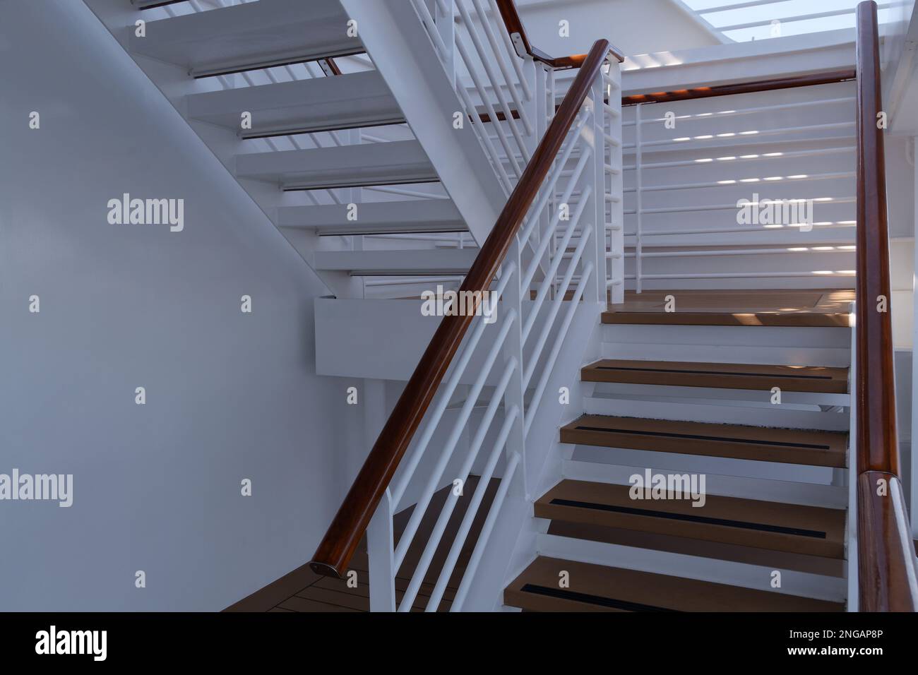 Wooden staircase with railings hi-res stock photography and images - Alamy