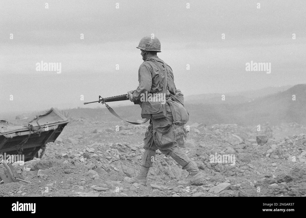 A U.S. 1st Calvalry trooper slowly advances on a suspected North ...