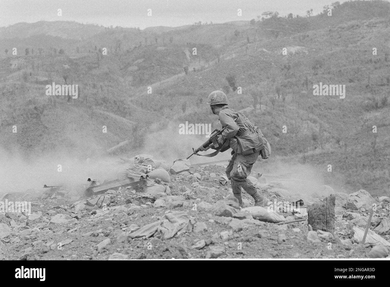 A U.S. 1st Calvalry trooper slowly advances on a suspected North ...