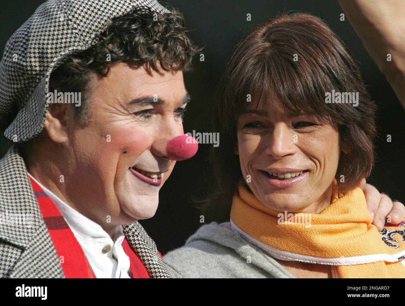 Princess Stephanie of Monaco poses with a clown on the eve of the 30th ...