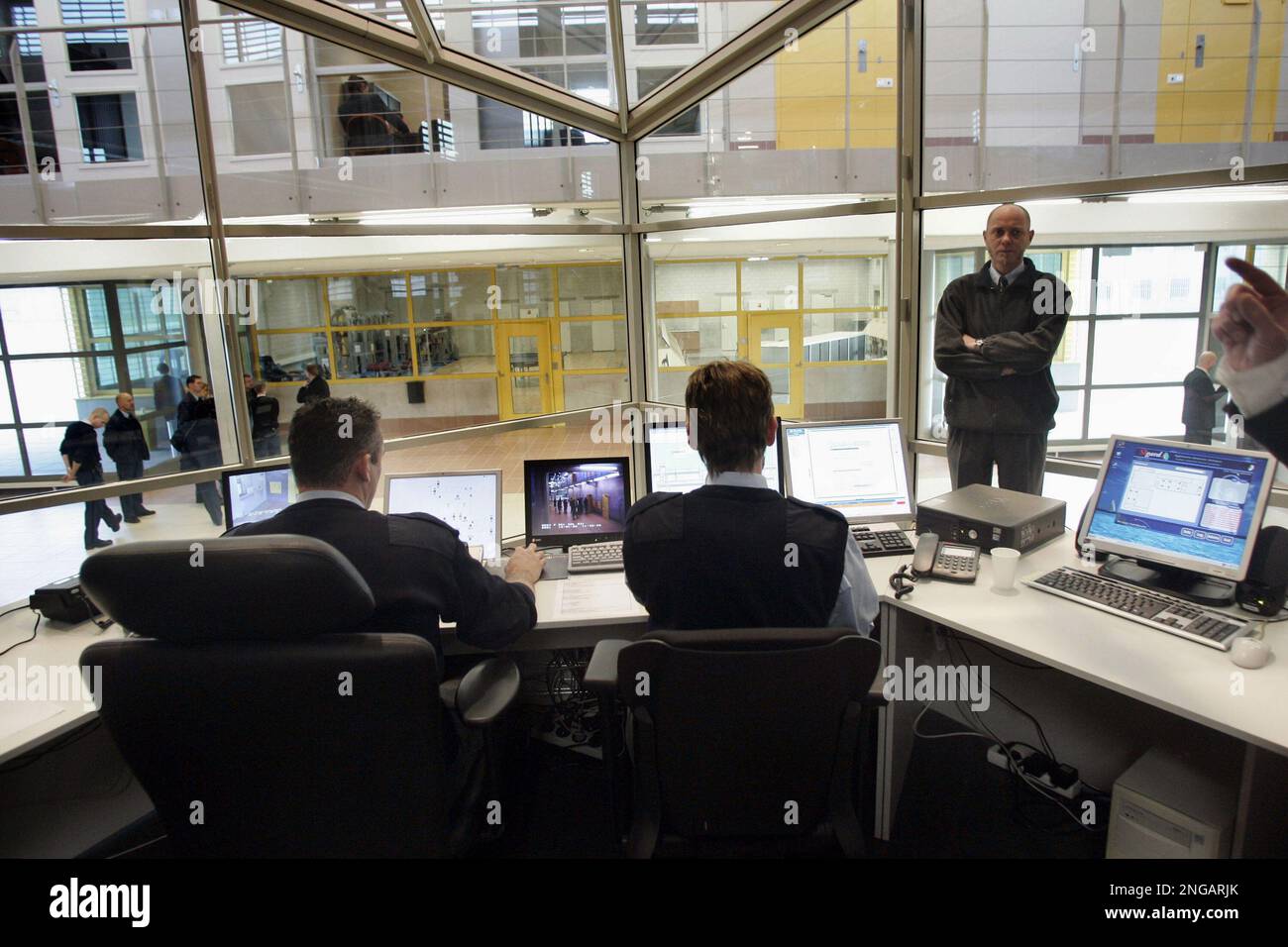 Security guards practice camera surveillance at the prison control ...