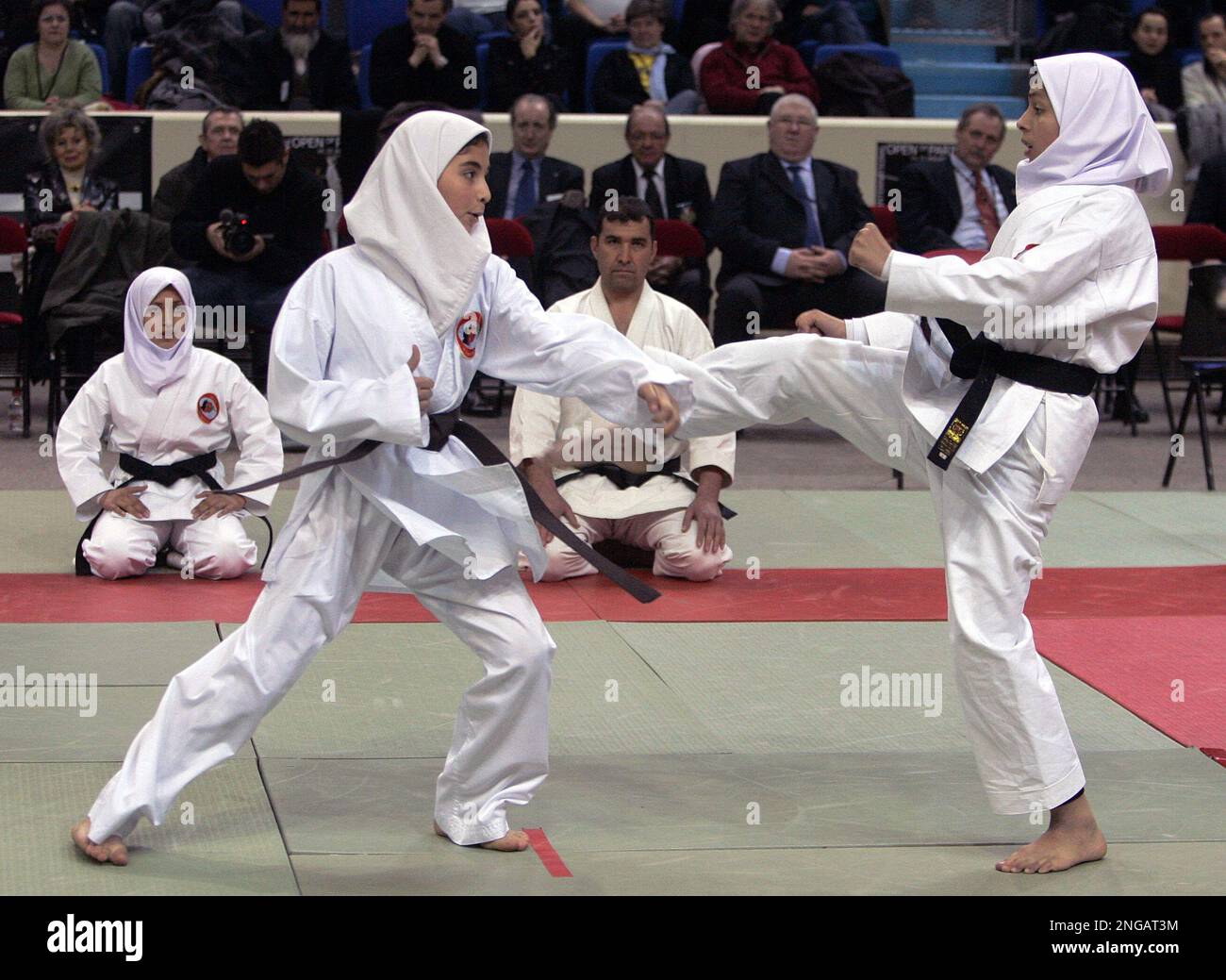 Zuhra Aktary, 16, left, and her sister Zeiba, 15, of Afghanistan, both ...