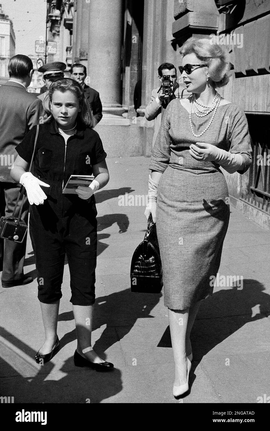 Zsa Zsa Gabor, right, walks with her 11-year-old daughter Francesca ...