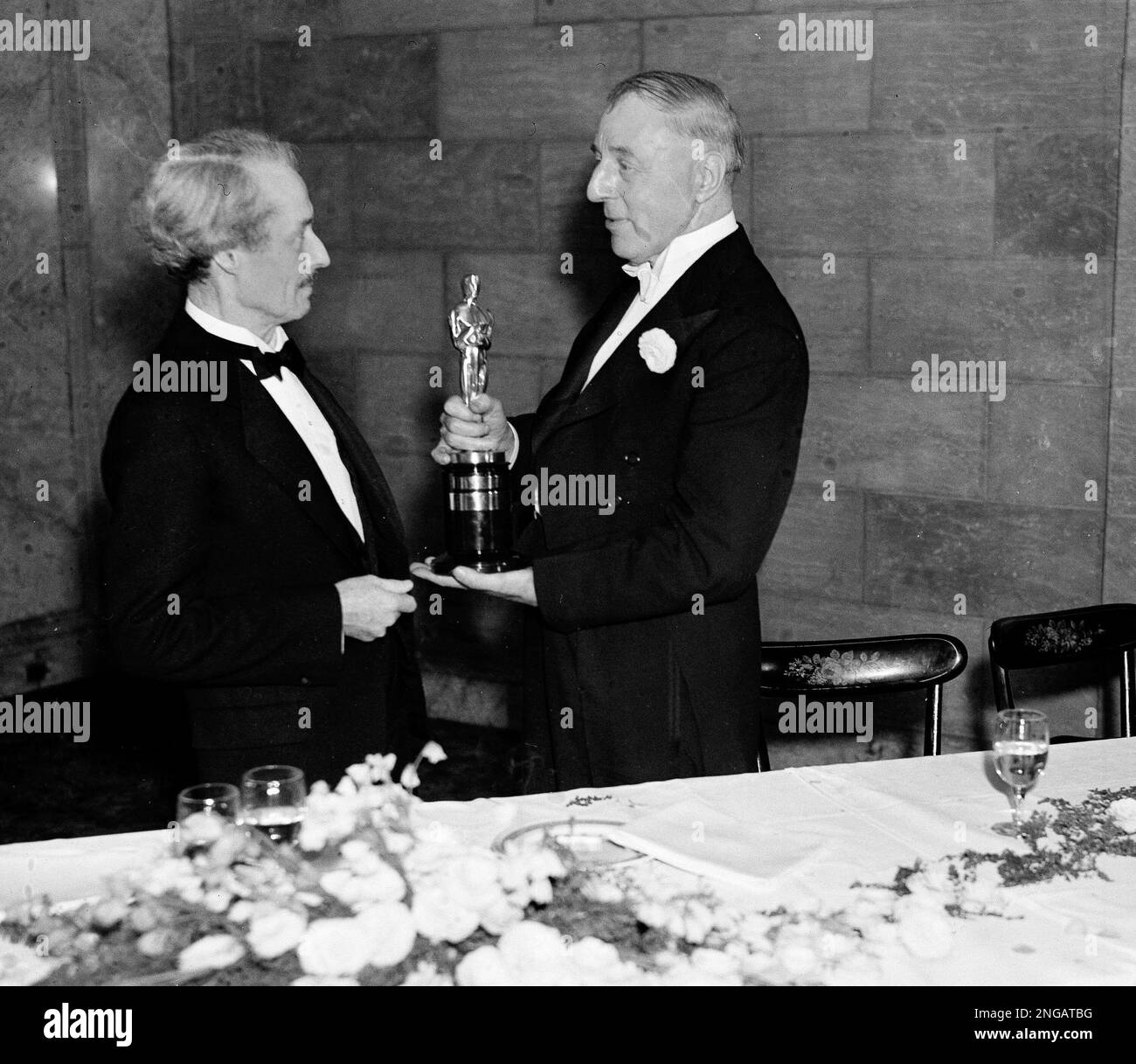 Director D.W. Griffith, right, is shown speaking to actor Henry B ...