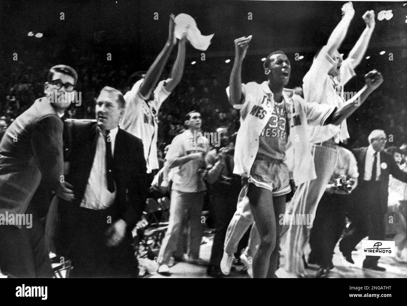 Texas Western College head basketball coach Don Haskins, second from ...
