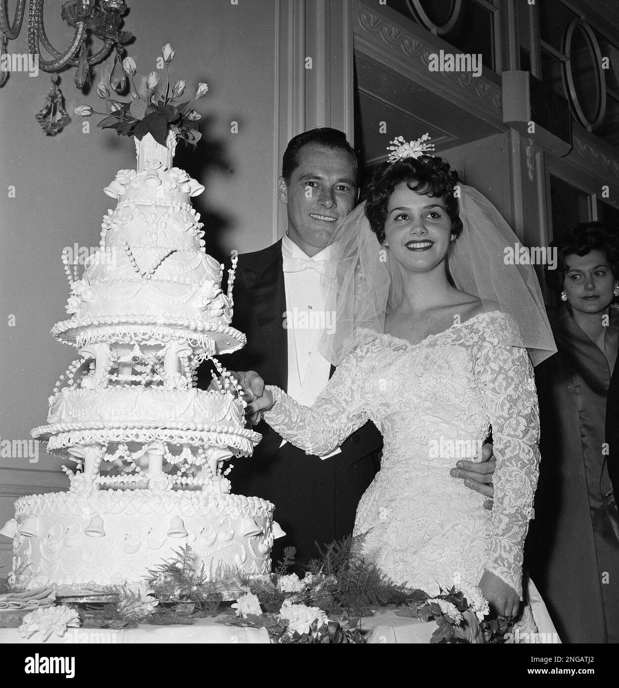 Conrad Nicholson Hilton, Jr., son of the hotel magnate, and his bride ...