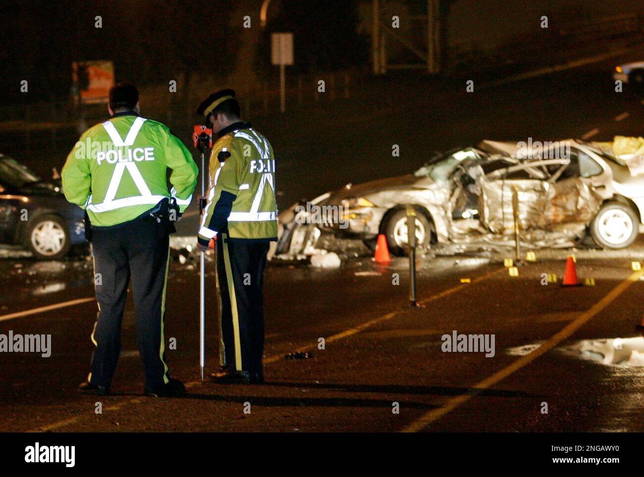 Rcmp Officers Investigate A Multiple Car Crash On The Approach To The
