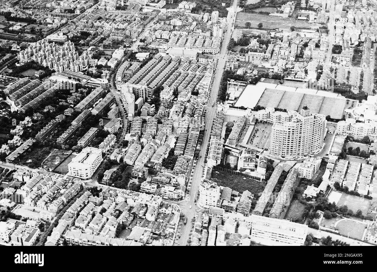 Aerial view of the French Concession in Shanghai. Down the centre runs ...